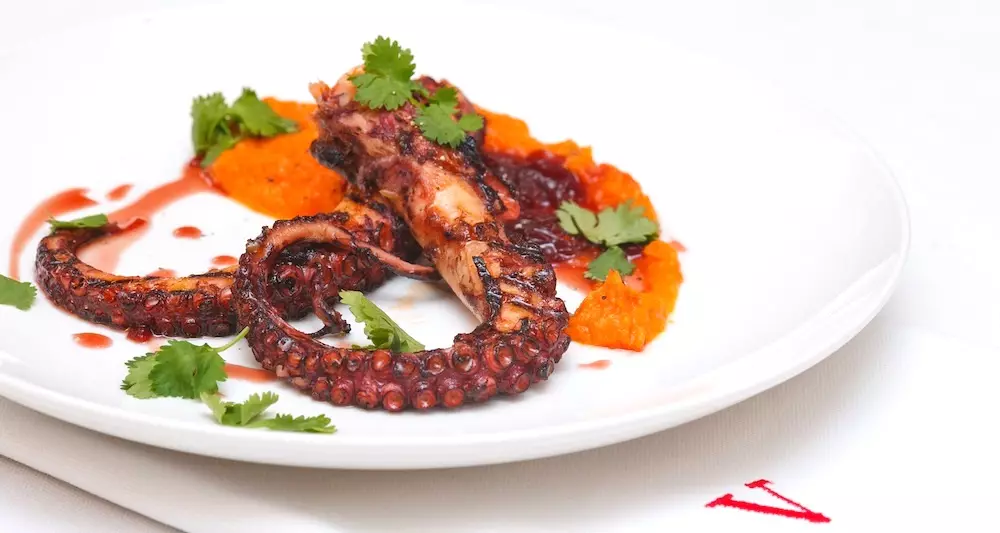 Octopus with pumpkin puree