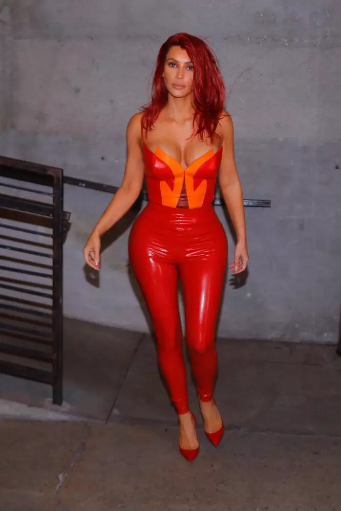 Kim Kardashian emphasized the lush bust in red leather jumpsuit 55580_1