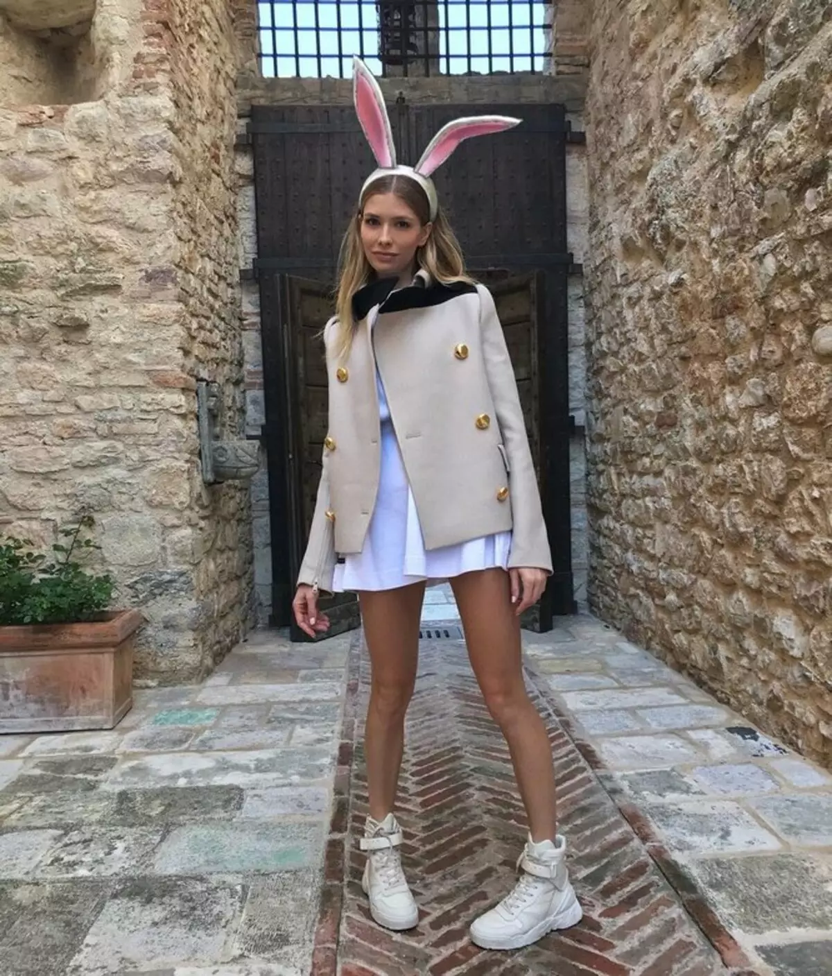 Elena Permnova in the Prada coat and with a hare's ears met a Catholic Easter 57014_1