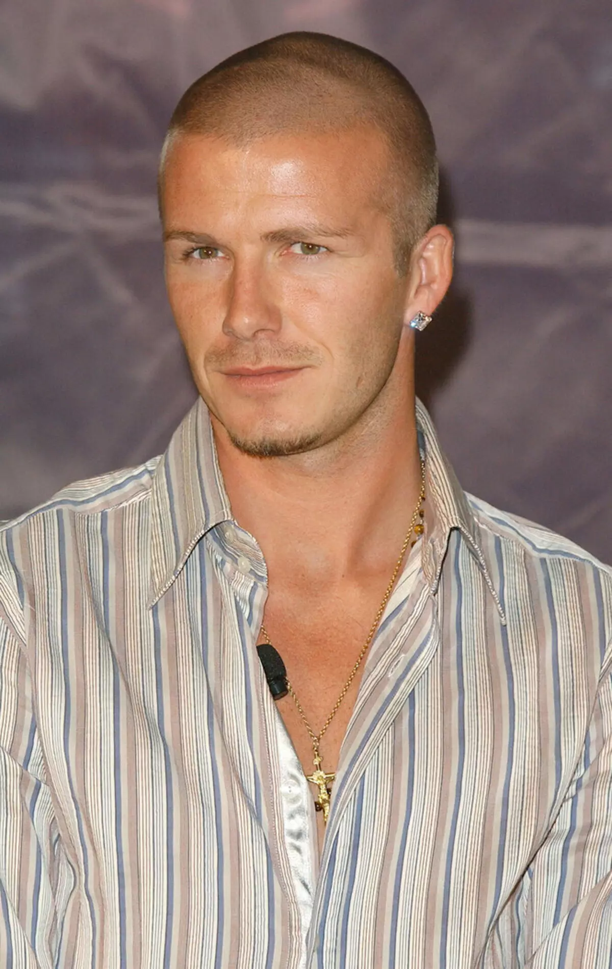 Fan 'e swiete knappe yn' e foarbyld heit: Hoe feroare David Beckham yn 25 jier feroare 7158_4